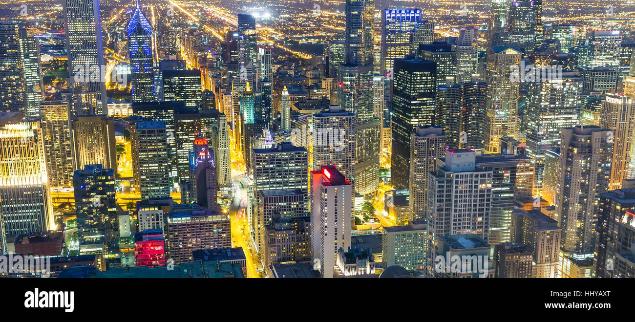 Illuminated skyscraper buildings, night view Stock Photo - Alamy