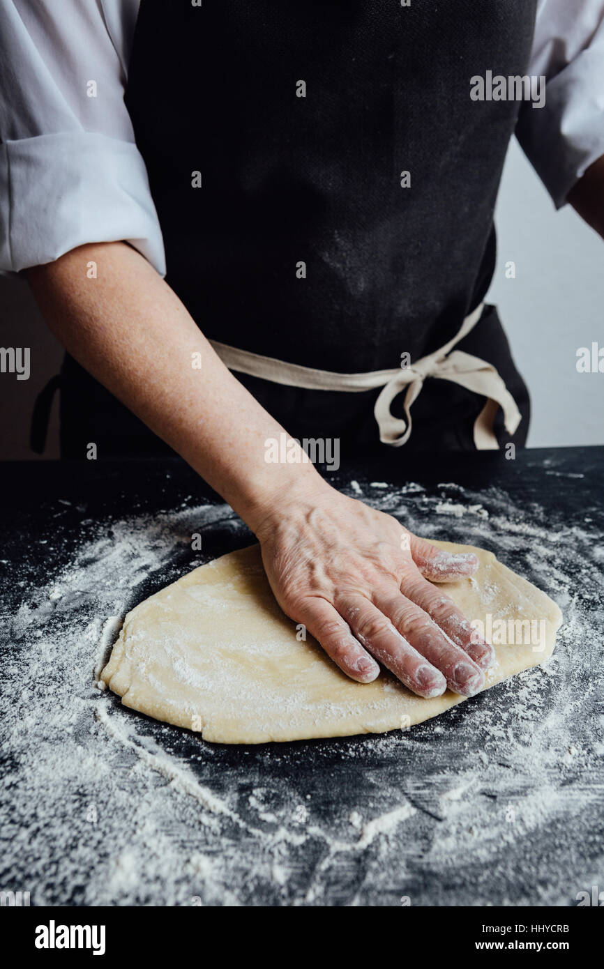 Person rolling homemade cookie dough Stock Photo - Alamy