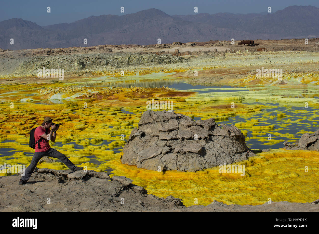 Photographer shooting the wild rock formations in the otherworldly ...