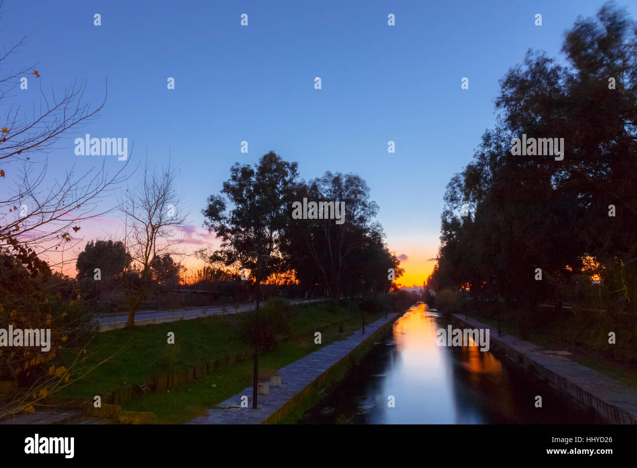 River reflections against setting hi-res stock photography and images ...