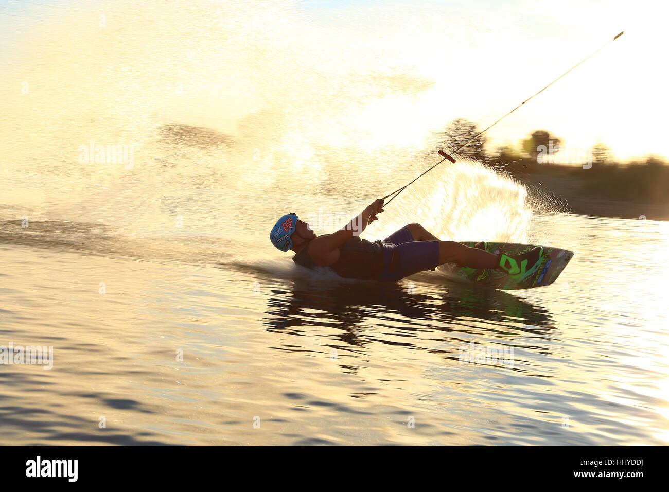 Sunset wakeboarding session in Alpipark Stock Photo - Alamy