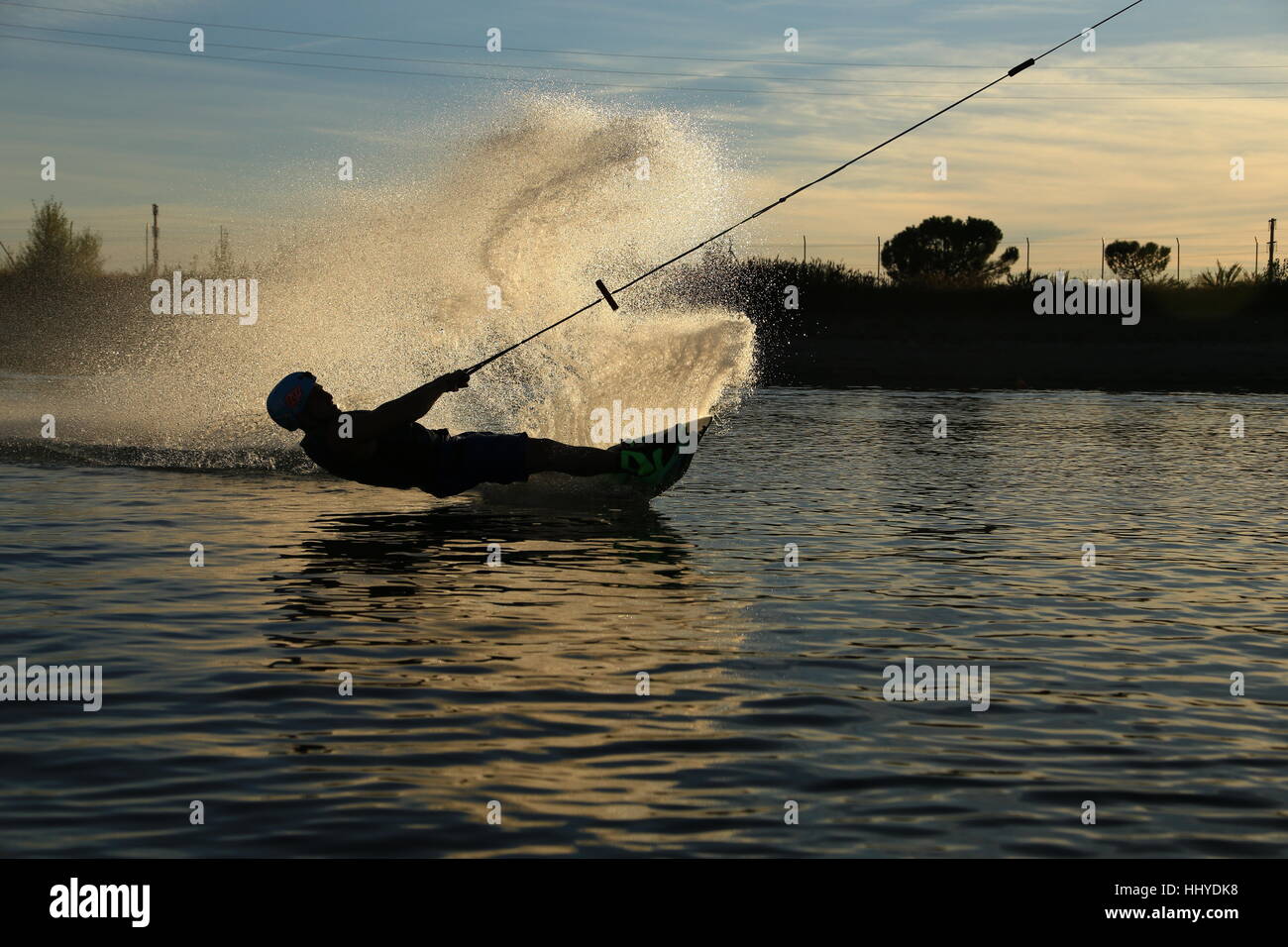 Sunset wakeboarding session in Alpipark Stock Photo - Alamy