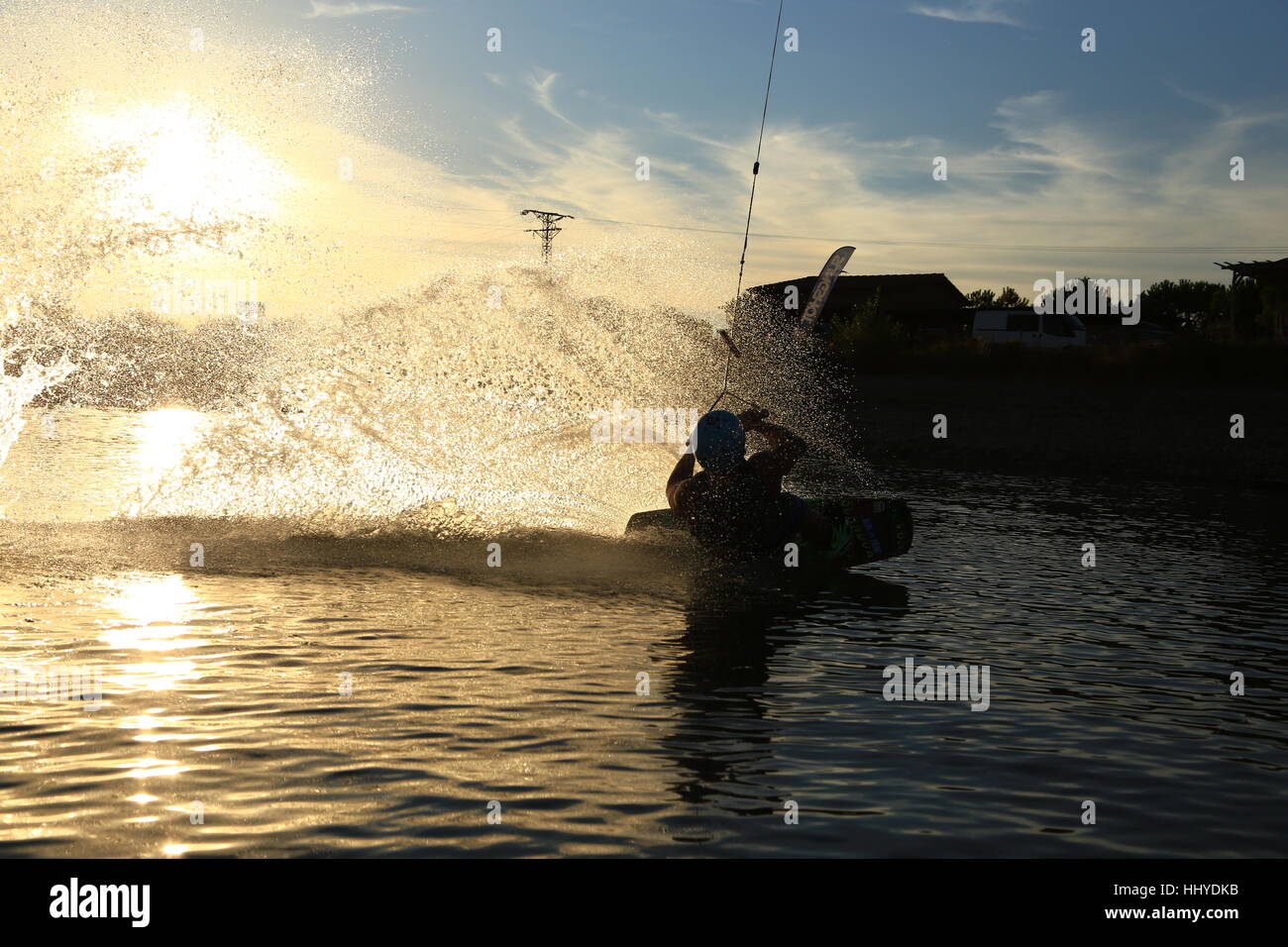 Sunset wakeboarding session in Alpipark Stock Photo - Alamy