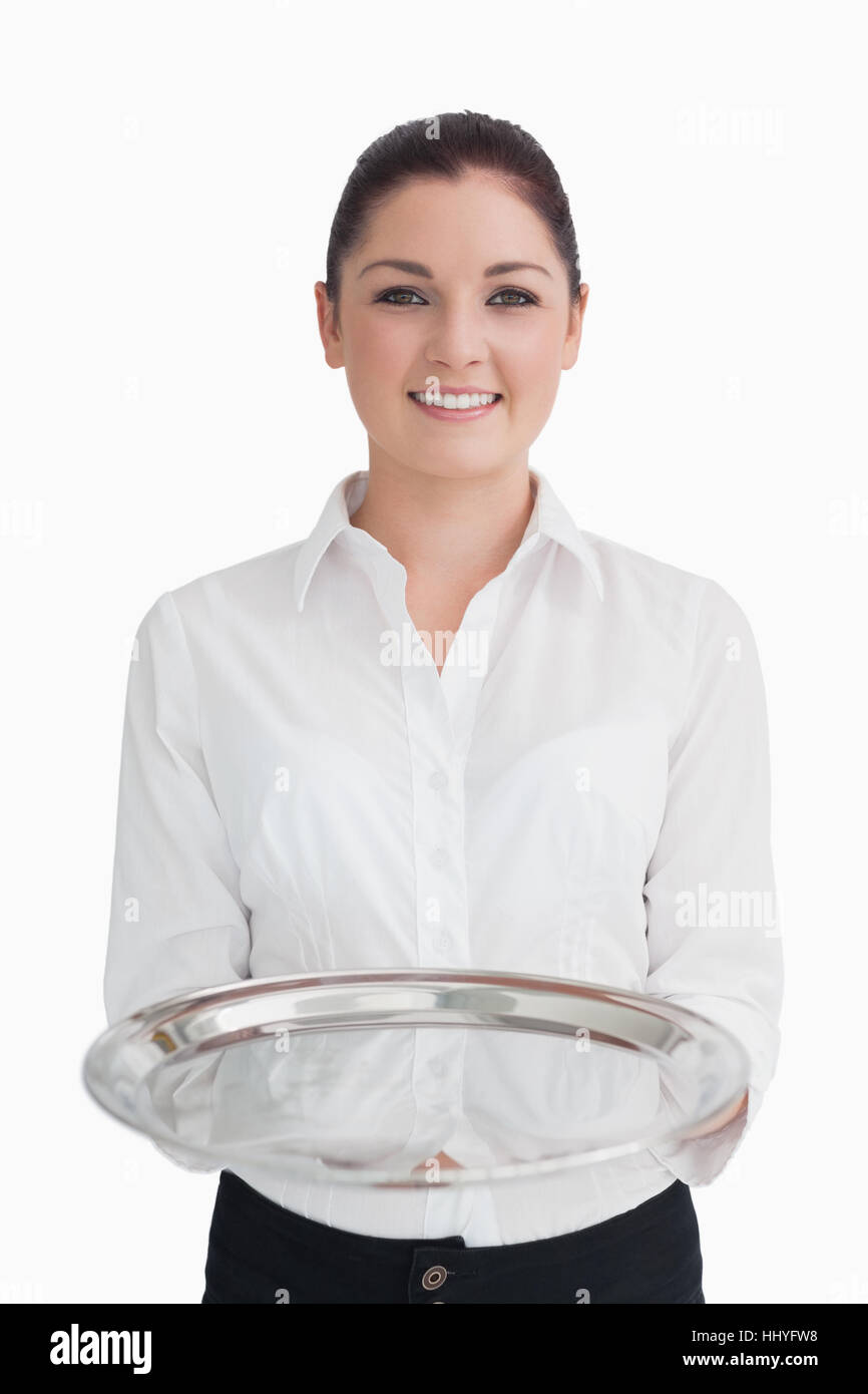 Waitress showing the silver tray Stock Photo - Alamy