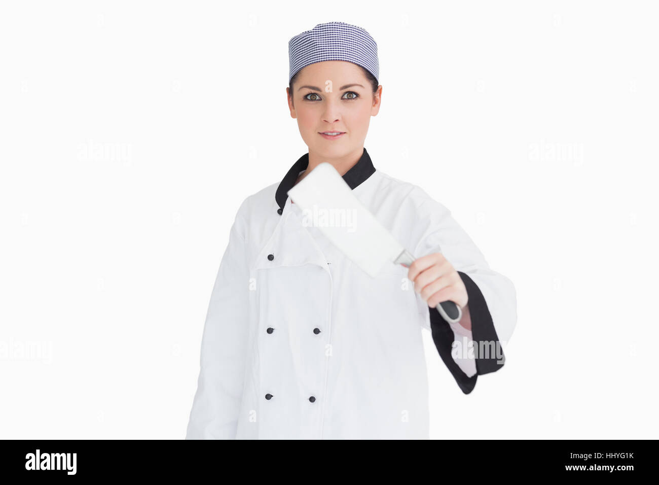Cook holding a meat cleaver on white background Stock Photo - Alamy
