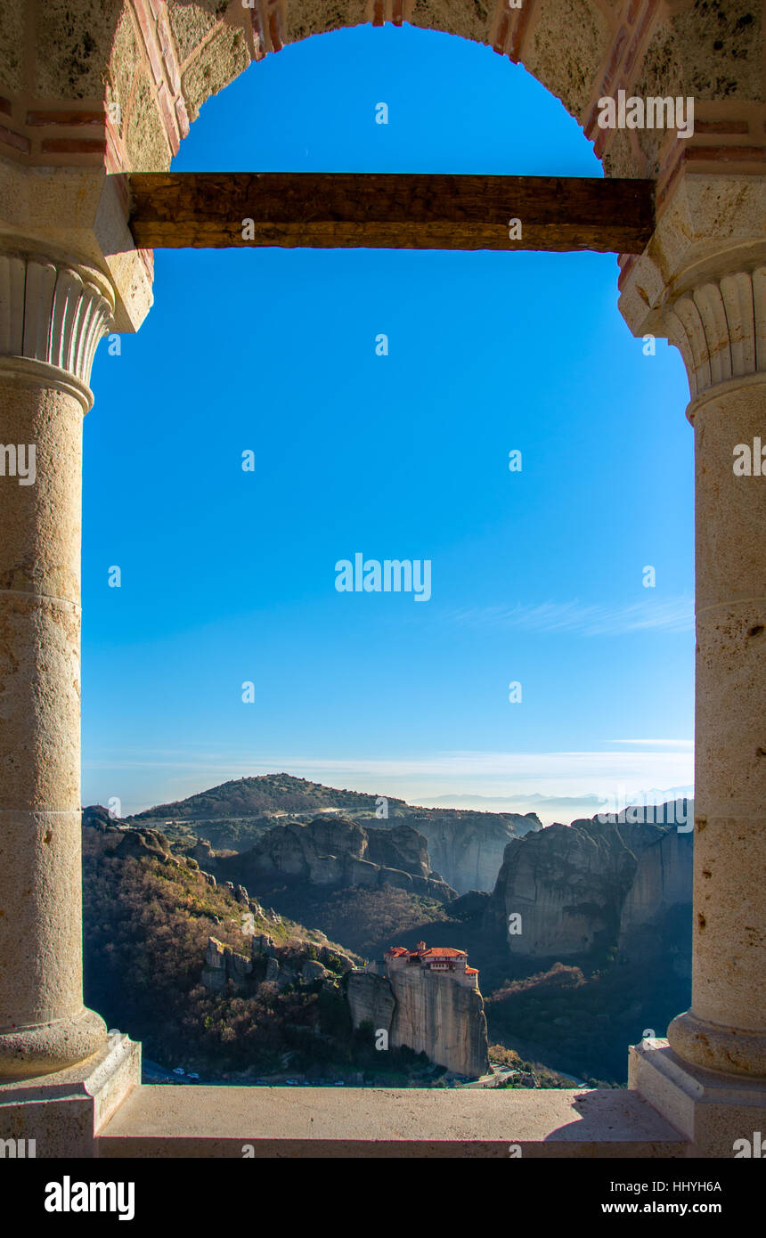 Breathtaking view of Meteora Roussanou Monastery, through a frame of ...