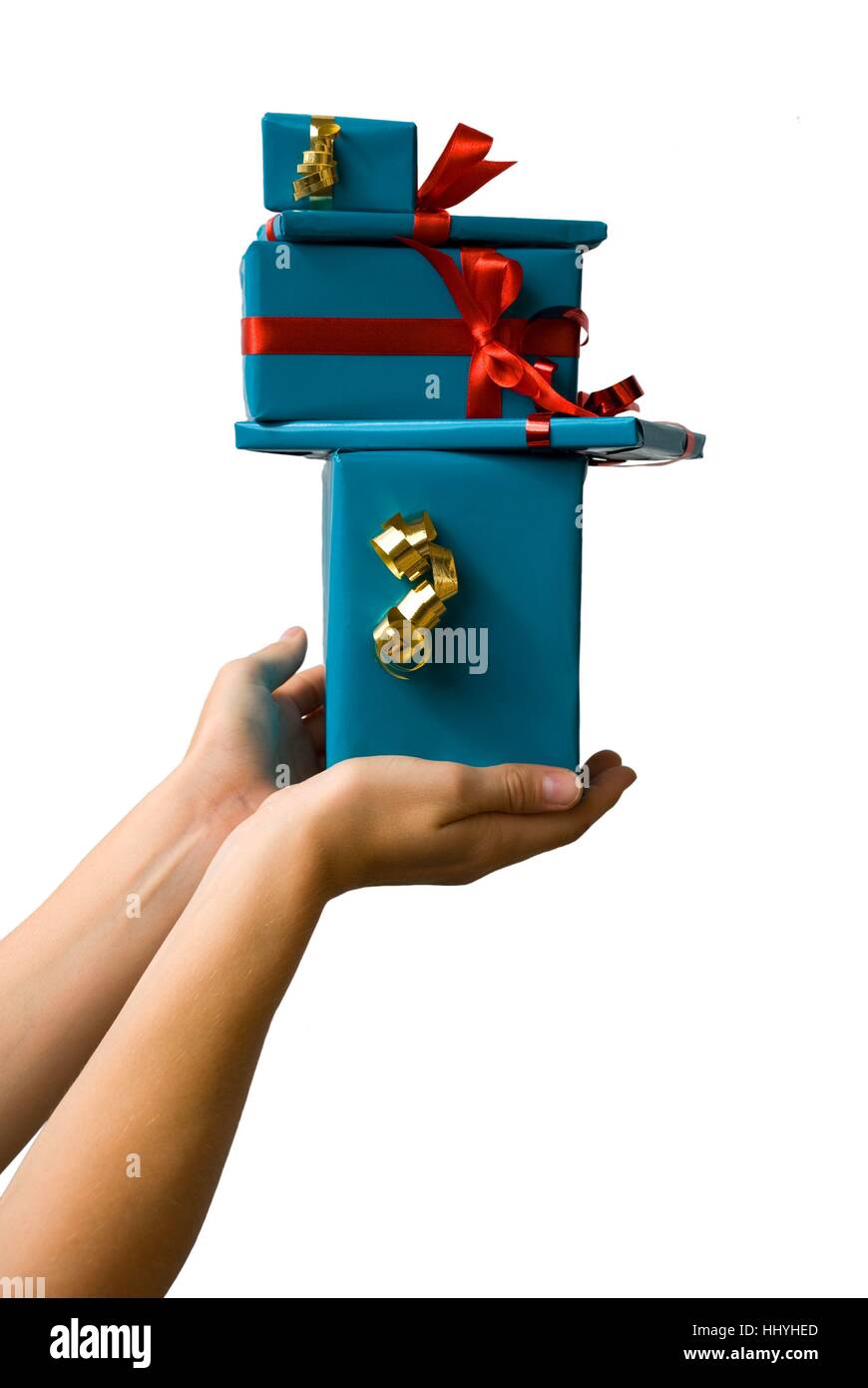 two hands holding many gifts, on white Stock Photo - Alamy