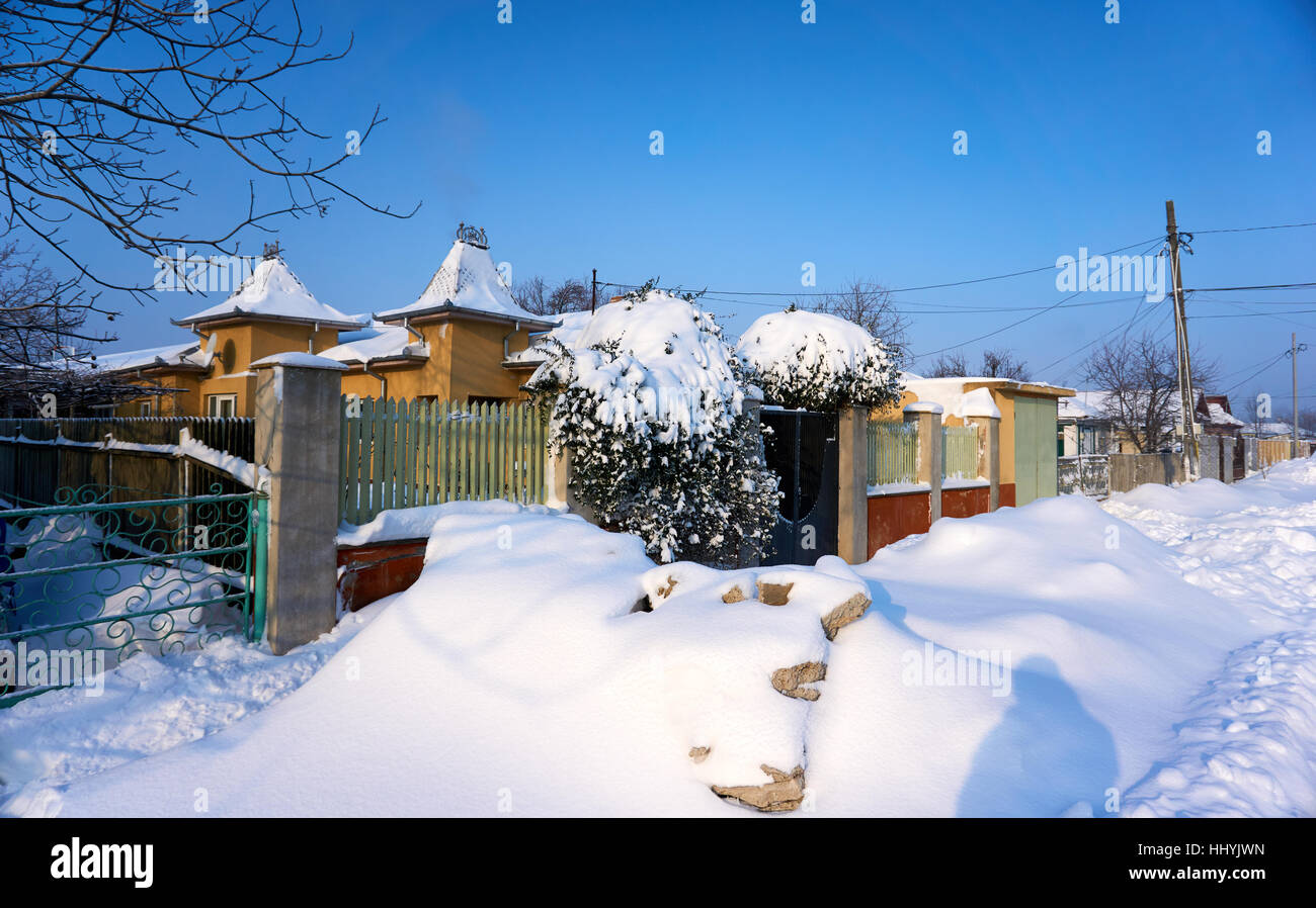 Amazing scenes with lot of snow happy birds and old house Stock Photo ...
