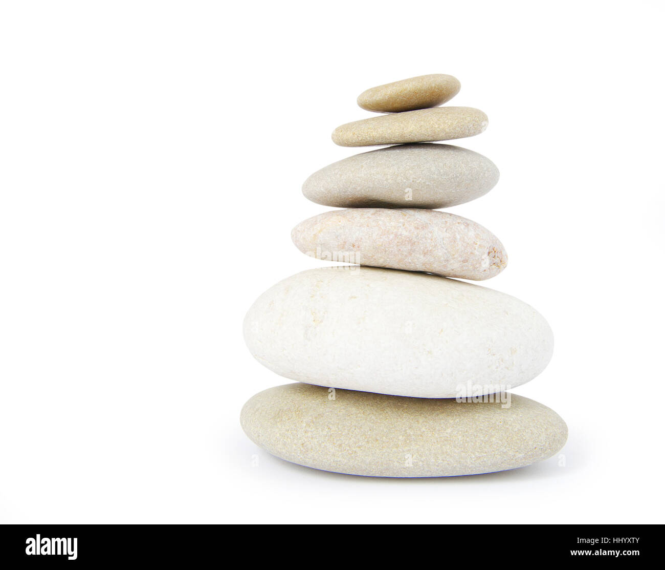 Stack of balanced stones on a white background Stock Photo - Alamy