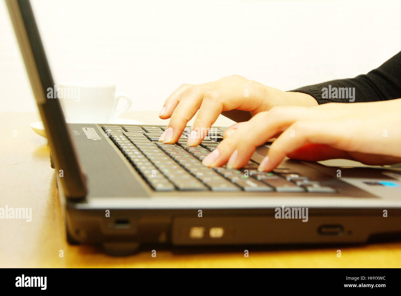 hands fast typing on laptop Stock Photo - Alamy