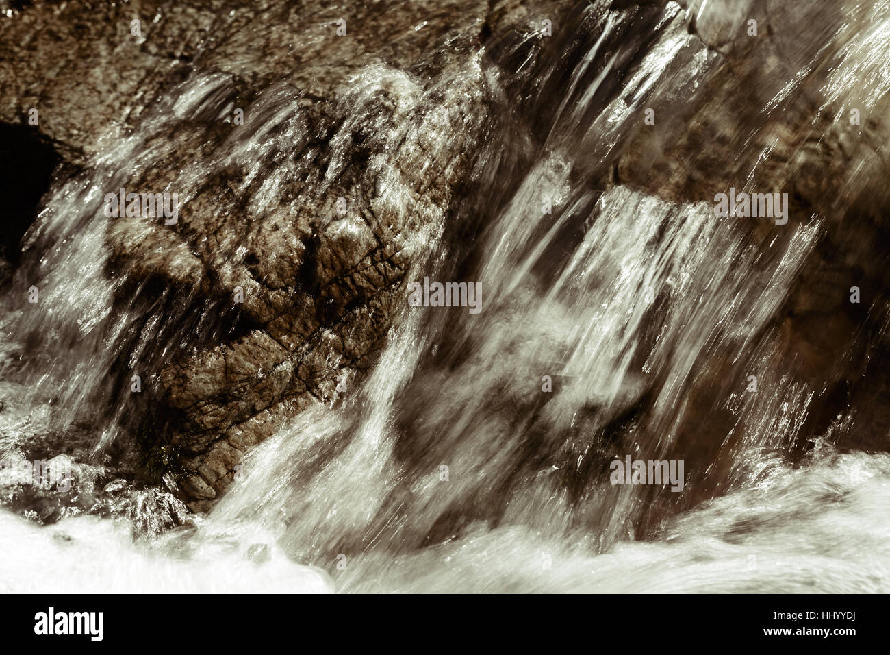 stone under the mountain water, note shallow depth of field Stock Photo ...