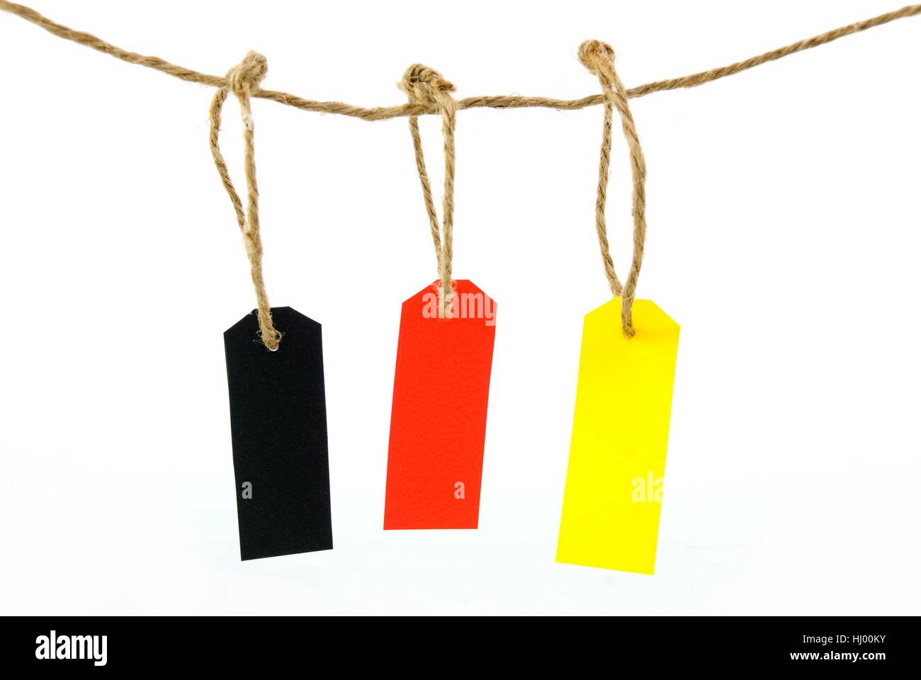 three hanging labels in different colours, isolated Stock Photo - Alamy