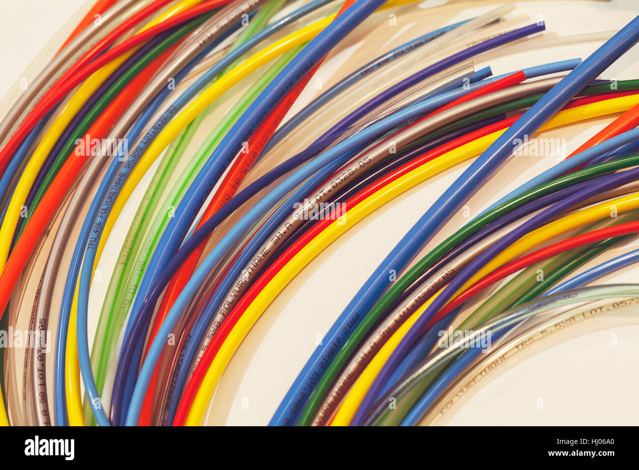 wires for various devices in different colors Stock Photo - Alamy