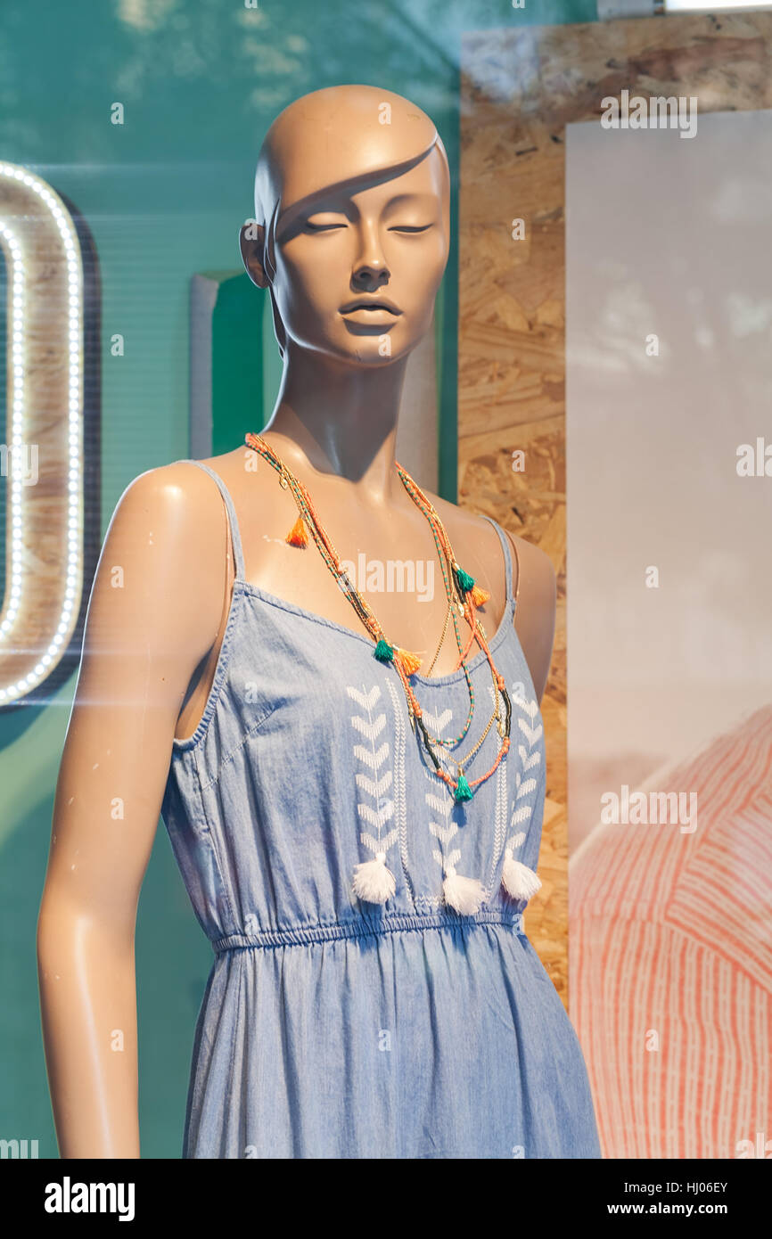 mannequins in a store window Stock Photo - Alamy