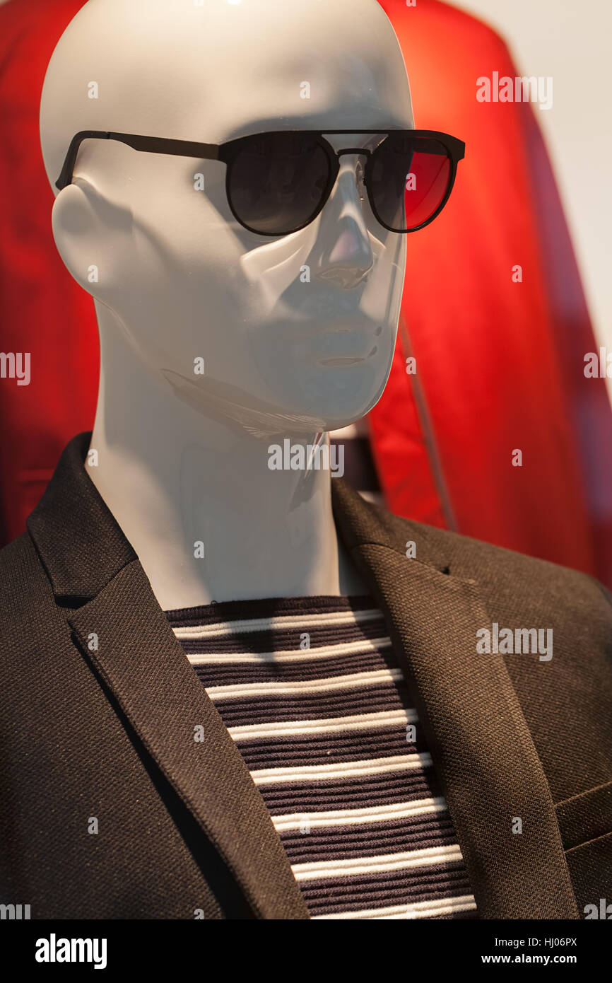 male dolls for display clothing in shop, note shallow depth of field ...