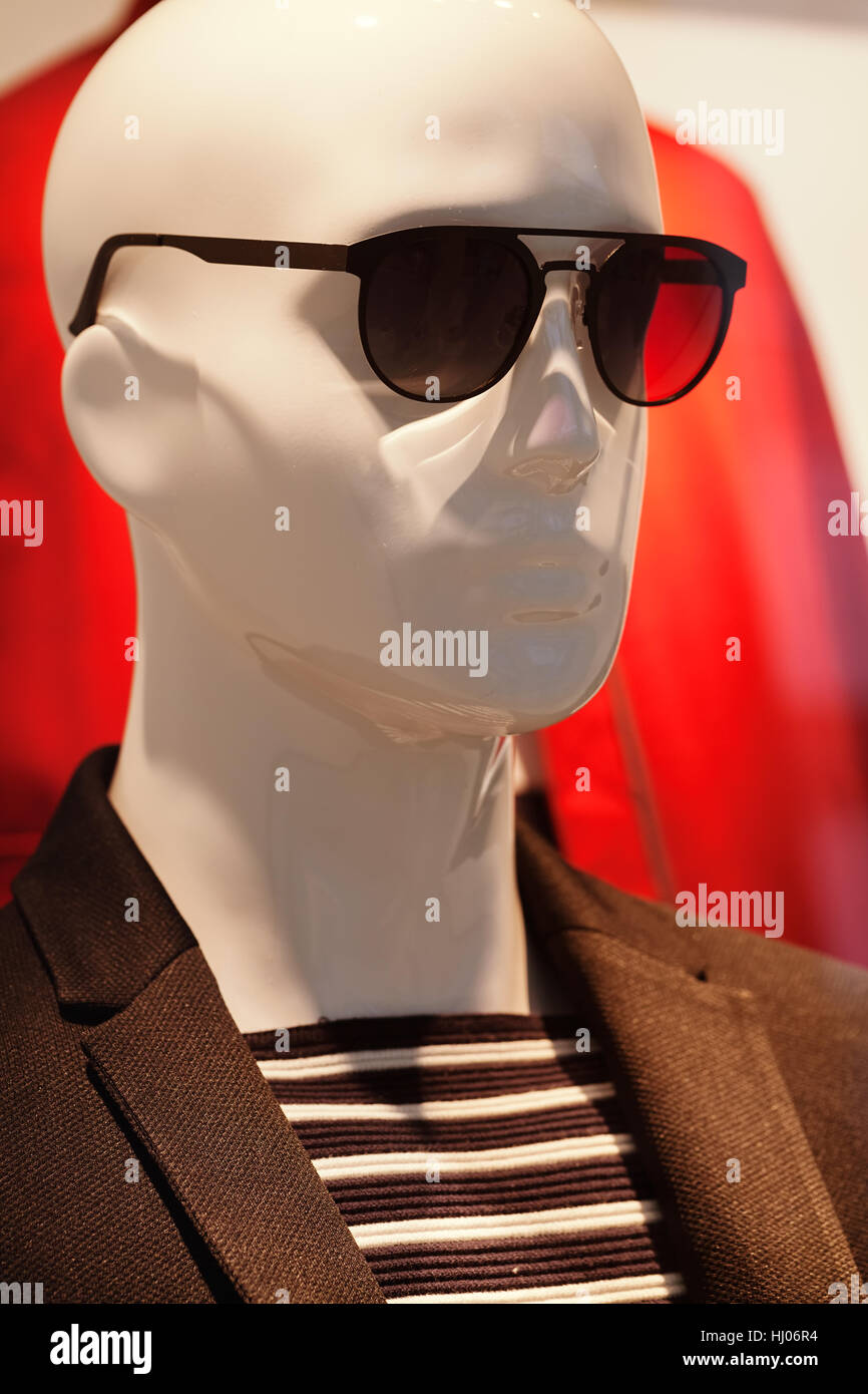 male dolls for display clothing in shop, note shallow depth of field ...