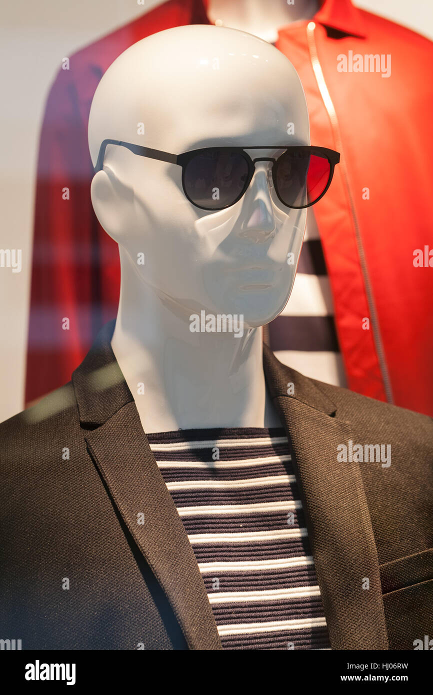 male dolls for display clothing in shop, note shallow depth of field ...