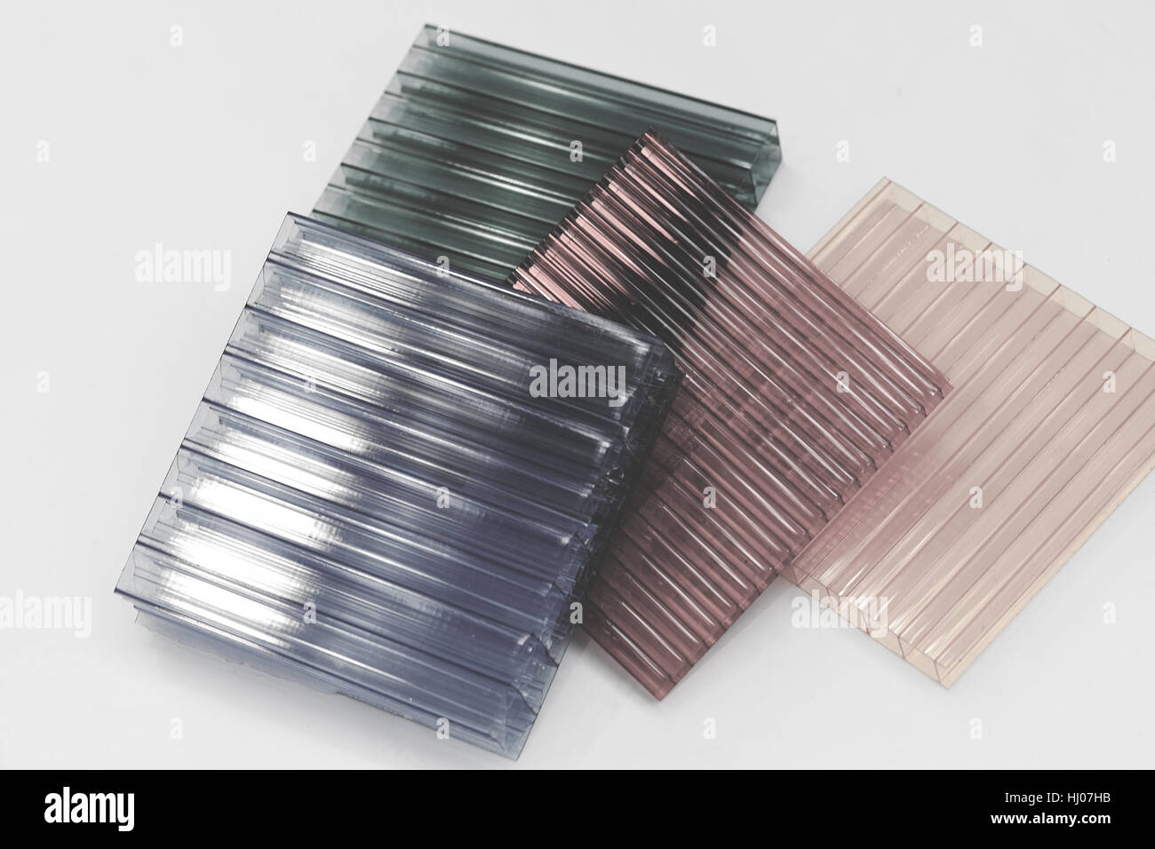 lexan samples in different colors on a white background, note shallow ...