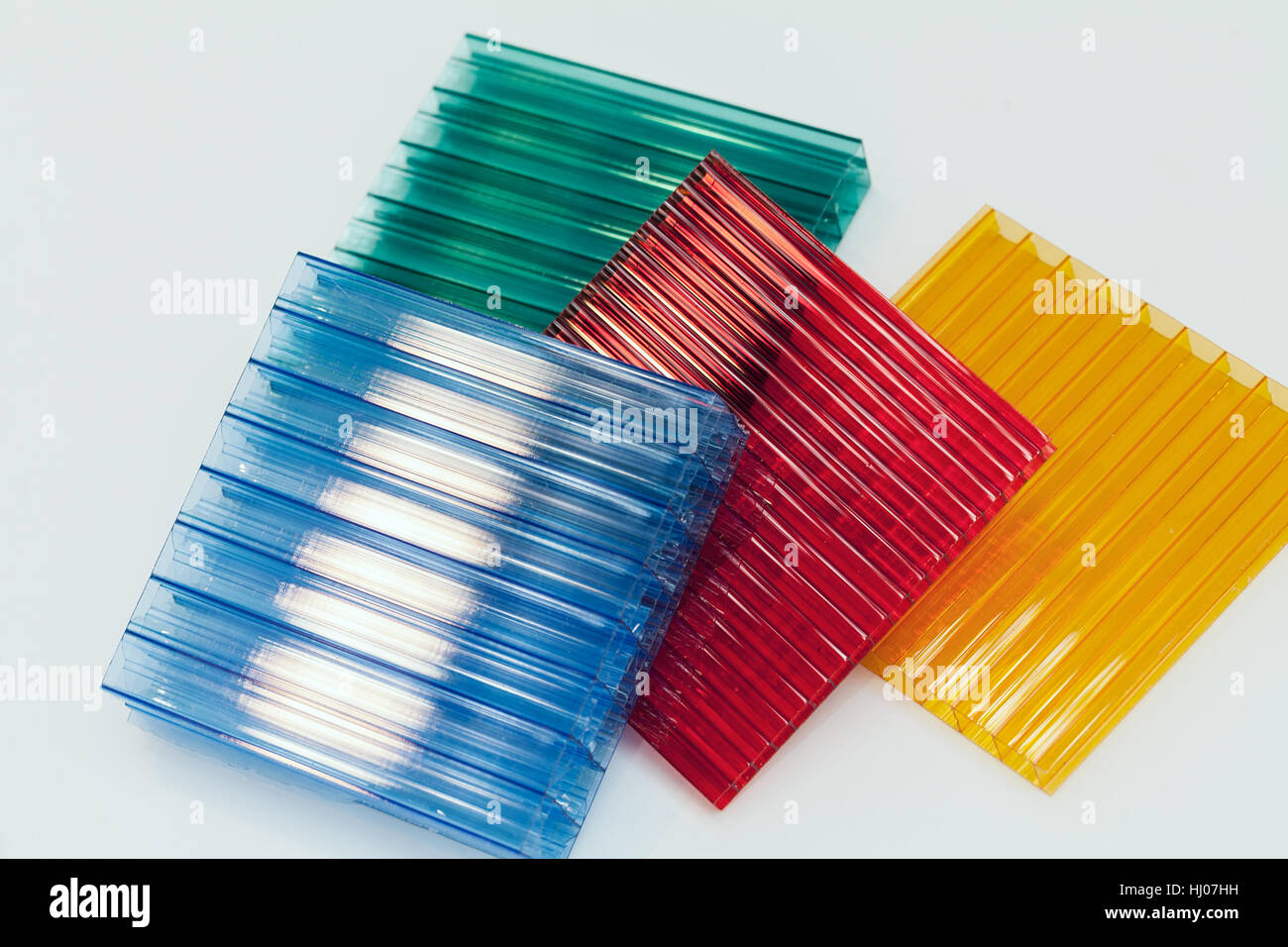 lexan samples in different colors on a white background, note shallow ...