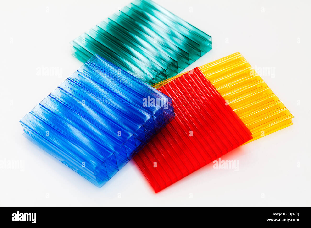 lexan samples in different colors on a white background, note shallow ...