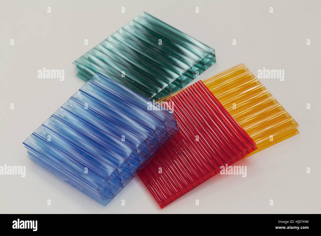 lexan samples in different colors on a white background, note shallow ...