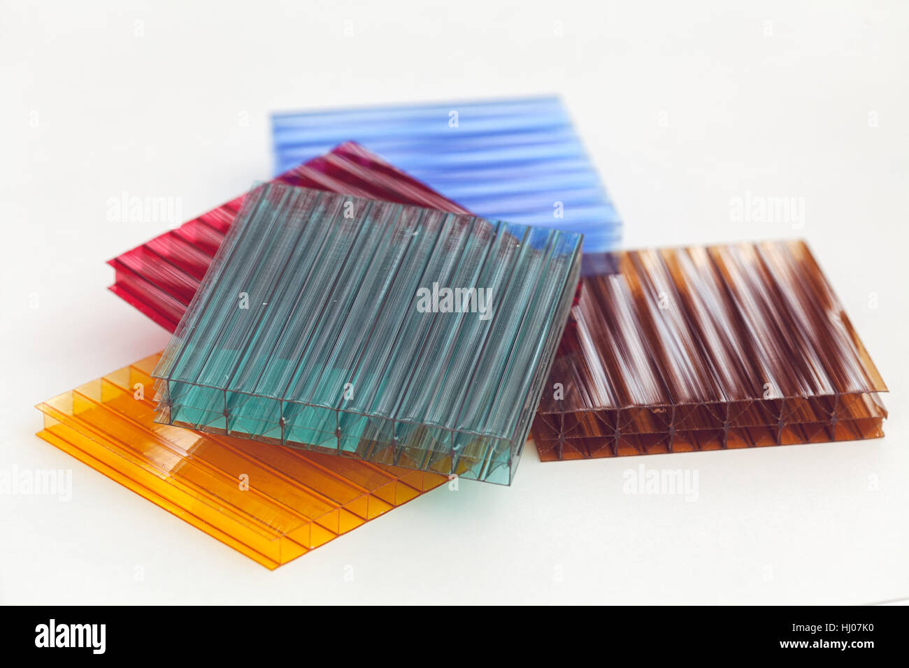 lexan samples in different colors on a white background, note shallow ...