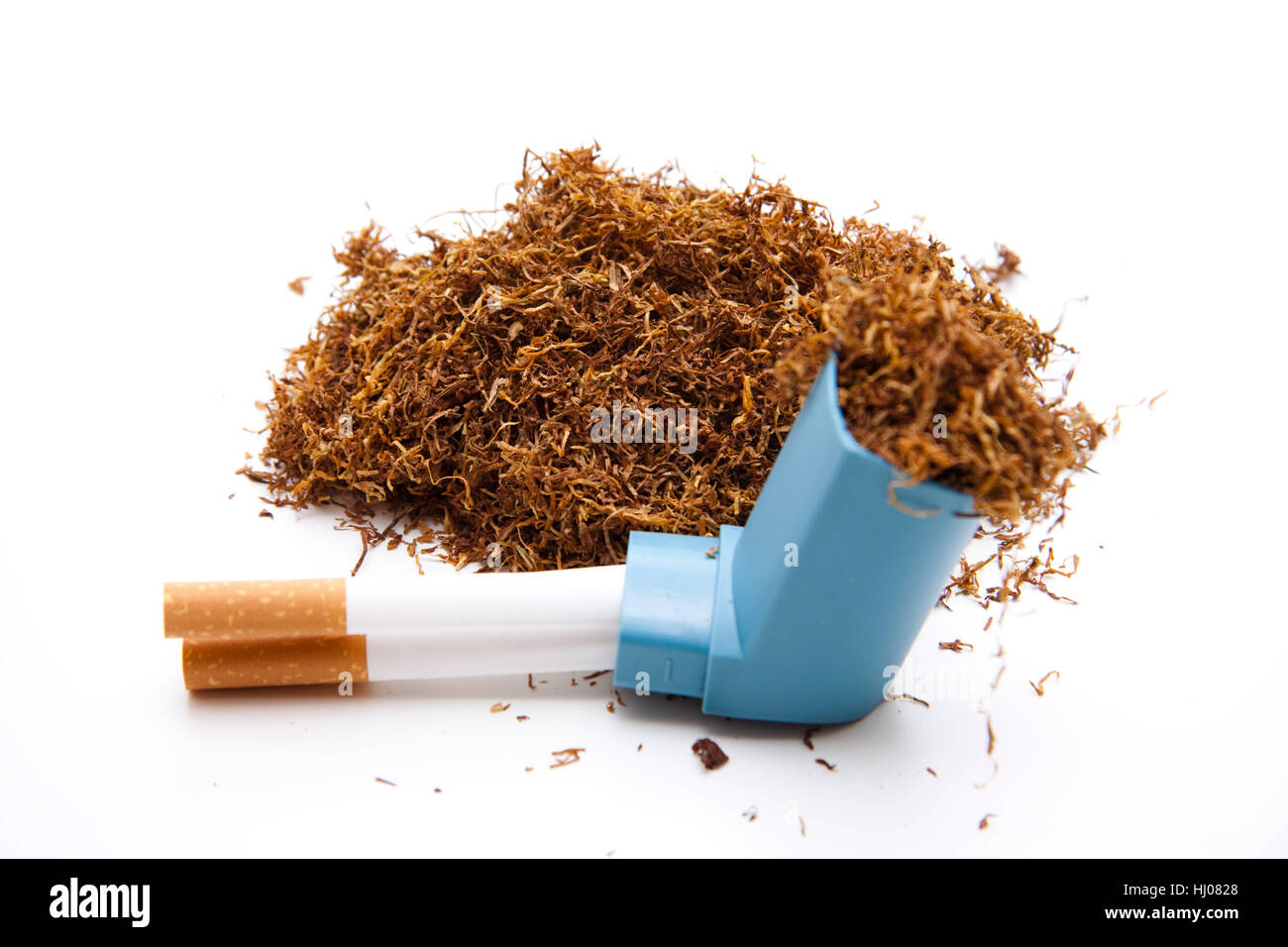 filling tobacco with sleeves Stock Photo - Alamy