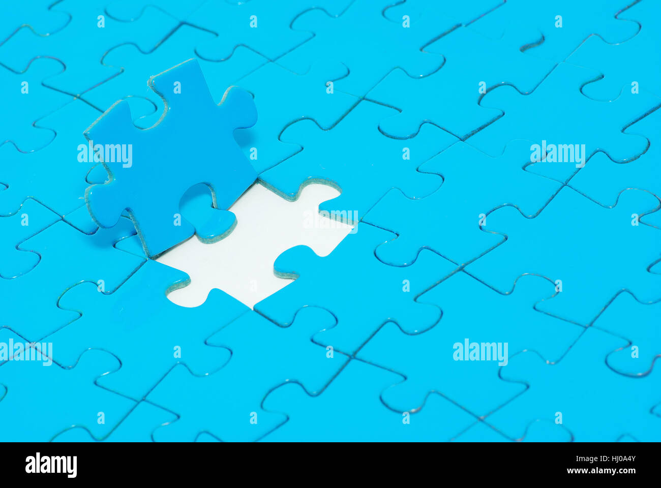 blue puzzles for background. business concept Stock Photo - Alamy