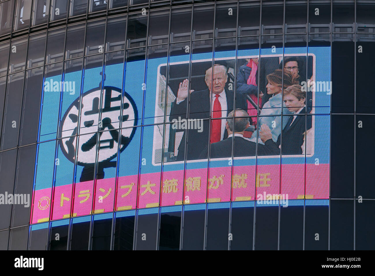 News of Donald Trump's presidency featured on a huge TV monitor screen ...