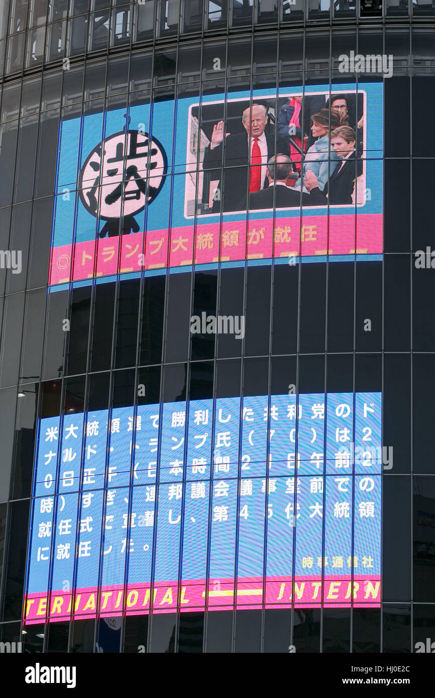 News of Donald Trump's presidency featured on a huge TV monitor screen ...