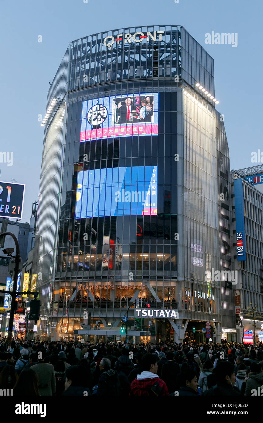 News of Donald Trump's presidency featured on a huge TV monitor screen ...