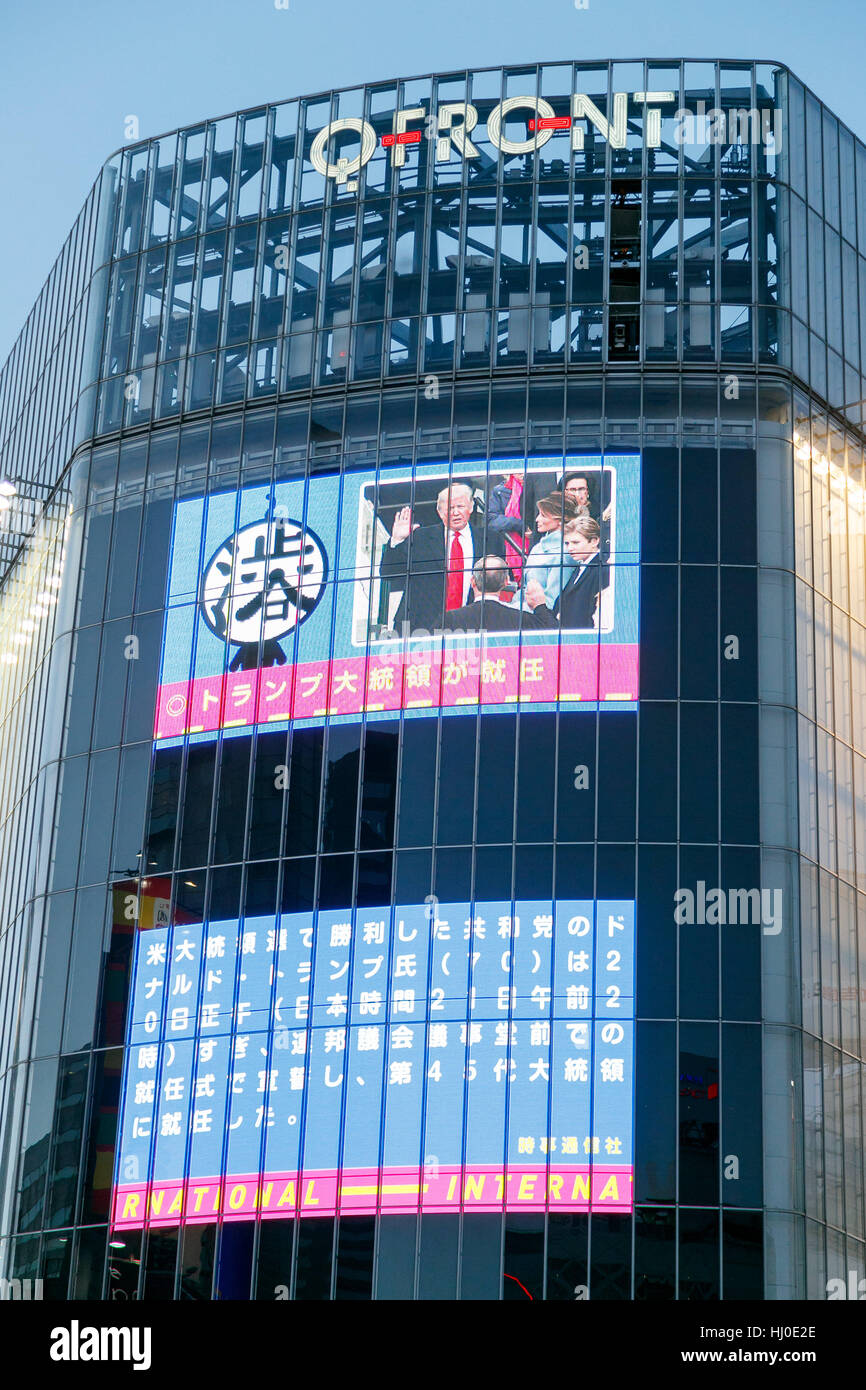 News of Donald Trump's presidency featured on a huge TV monitor screen ...