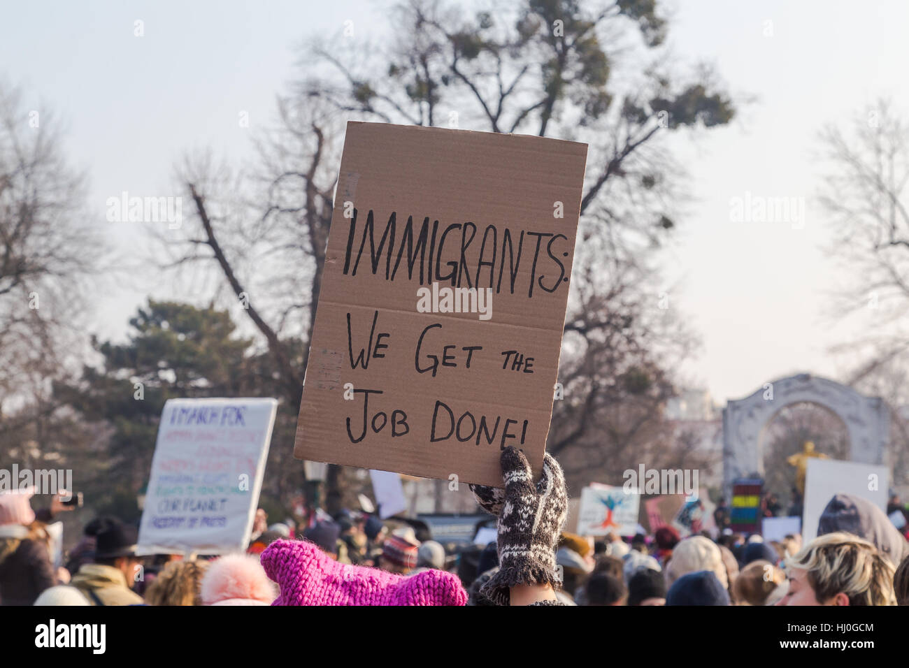 Vienna, Austria. 21st Jan, 2017. IMMIGRANTS We Get The Job Done banner ...