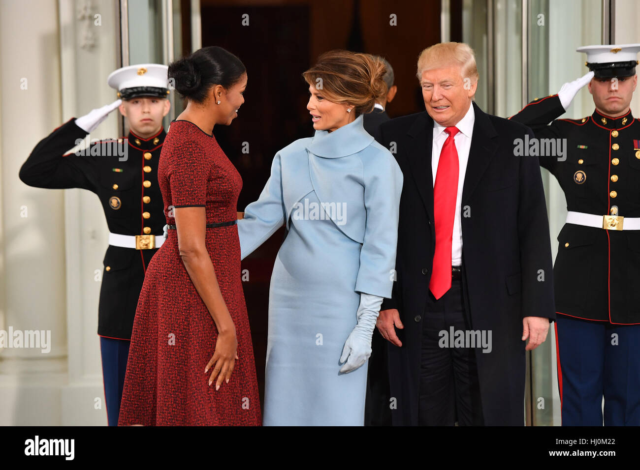 First Lady Michelle Obama (L) greets President-elect Donald Trump and ...