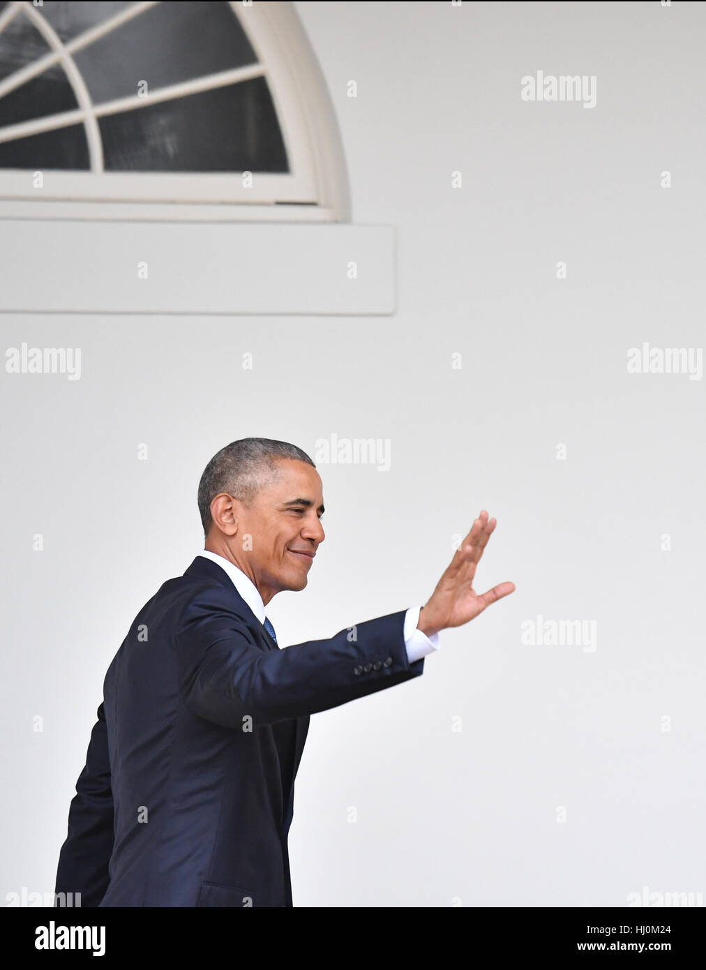 President Barak Obama waves as he leaves the White House for the final ...