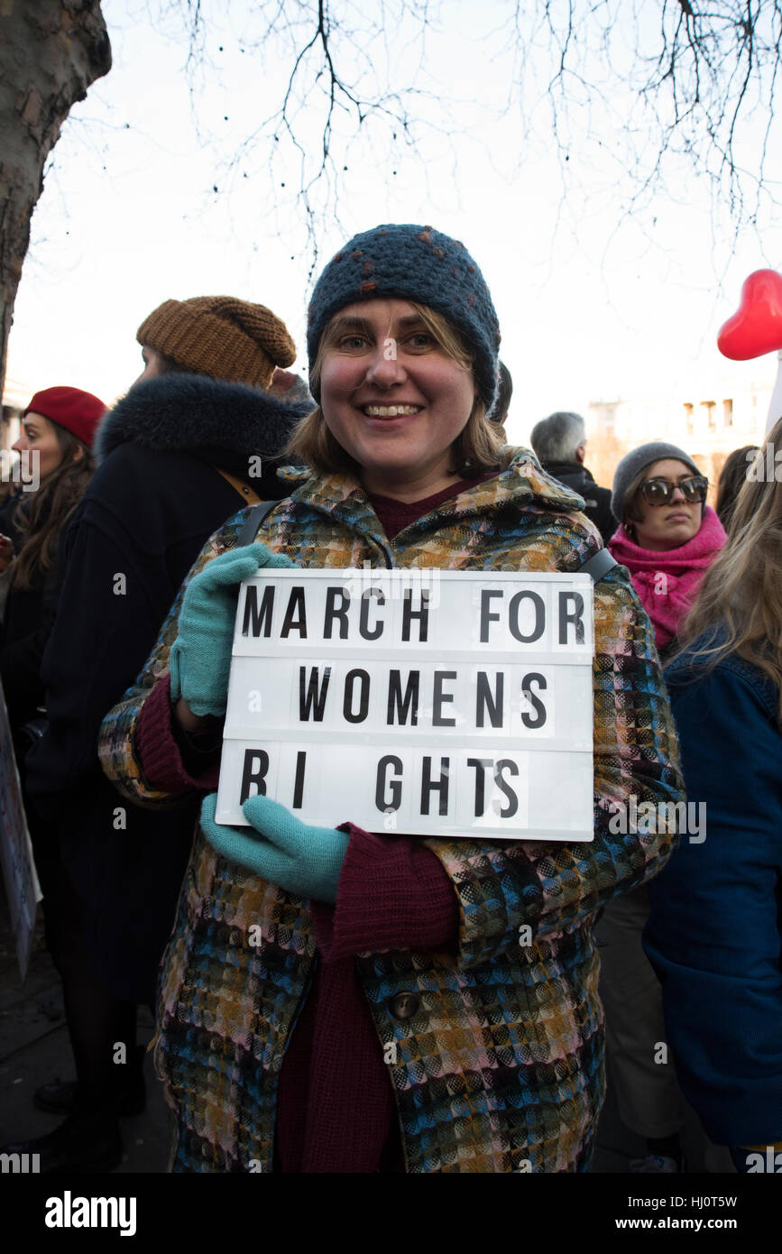 A female protestor proudly presenting her sign during the Womens march ...