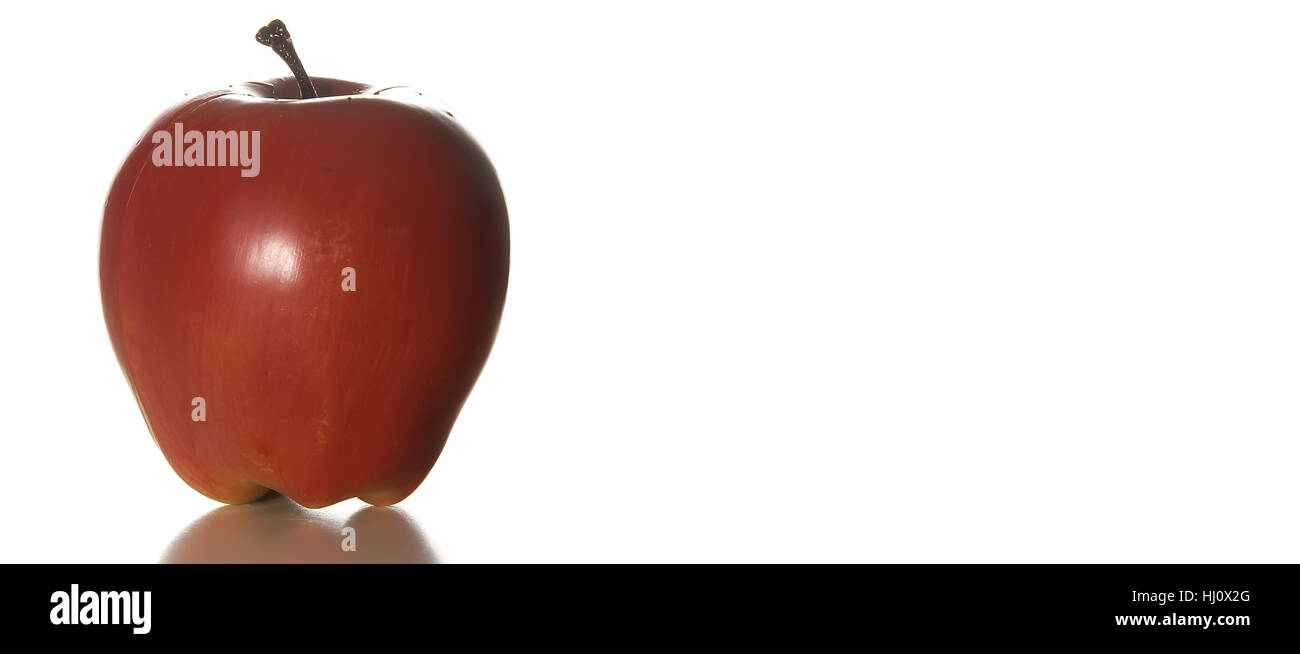 Apple standing alone in front of white background Stock Photo - Alamy