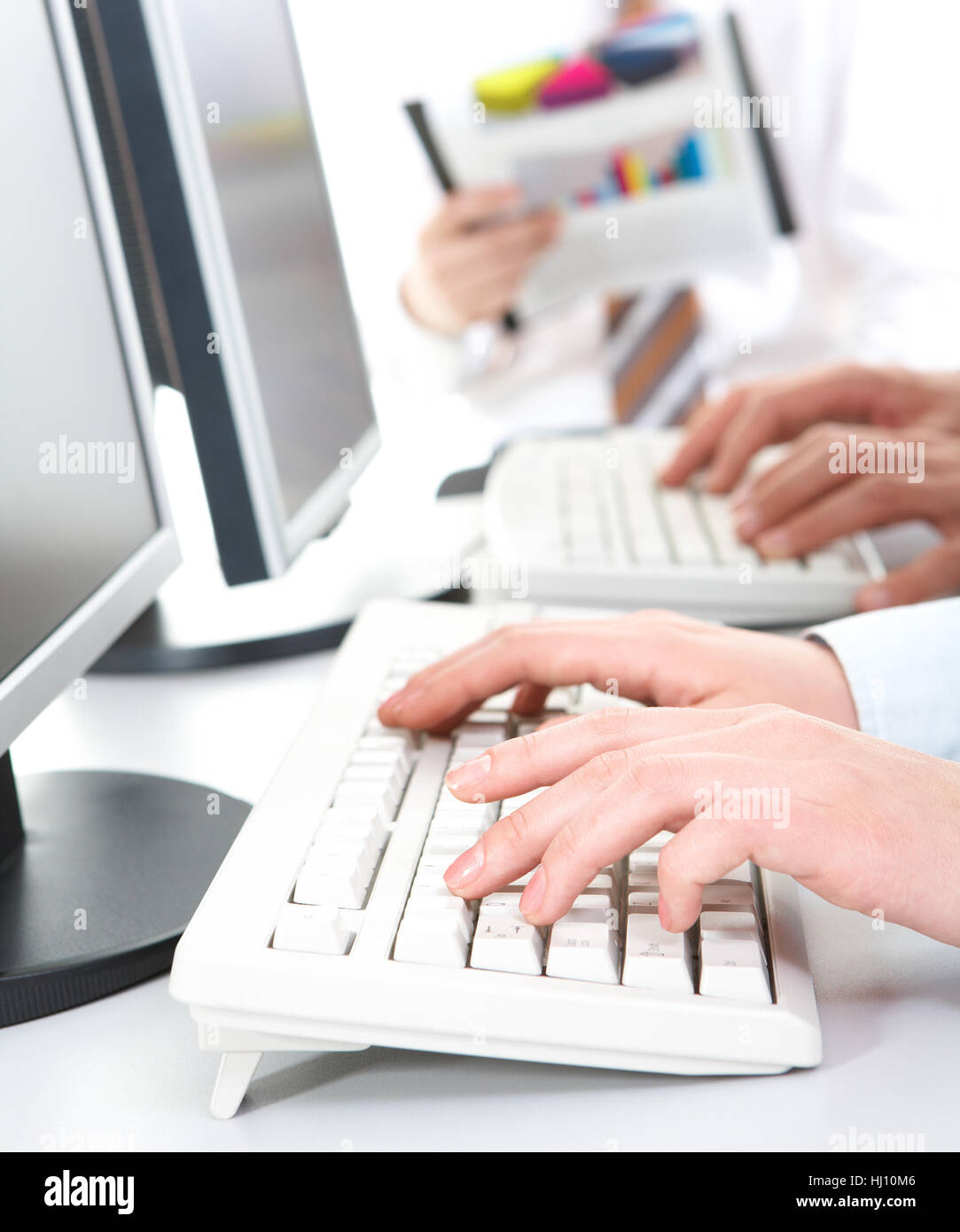 Photo of female hands pushing keys of computer keyboard Stock Photo - Alamy