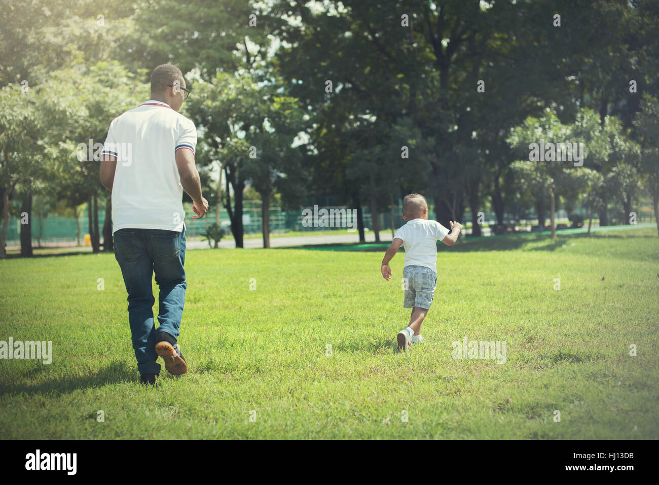 Child parent healthy run black hi-res stock photography and images - Alamy