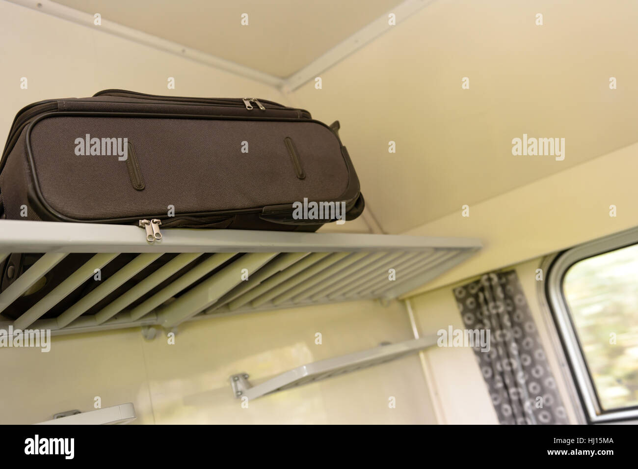 Train luggage rack hi-res stock photography and images - Alamy