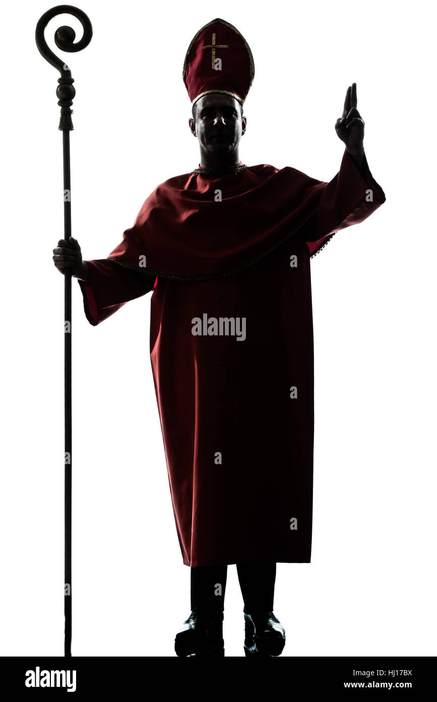 one man cardinal bishop silhouette saluting blessing in studio isolated ...