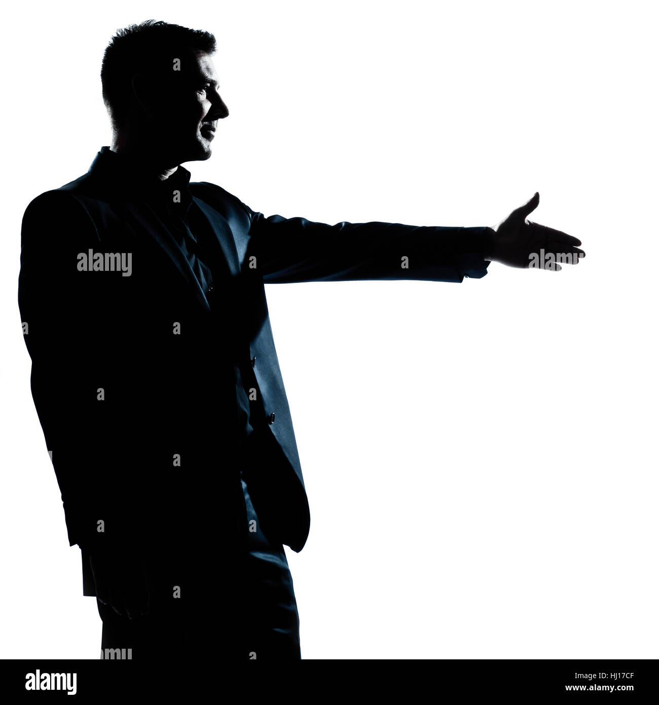 one caucasian man handshake profile portrait silhouette in studio ...