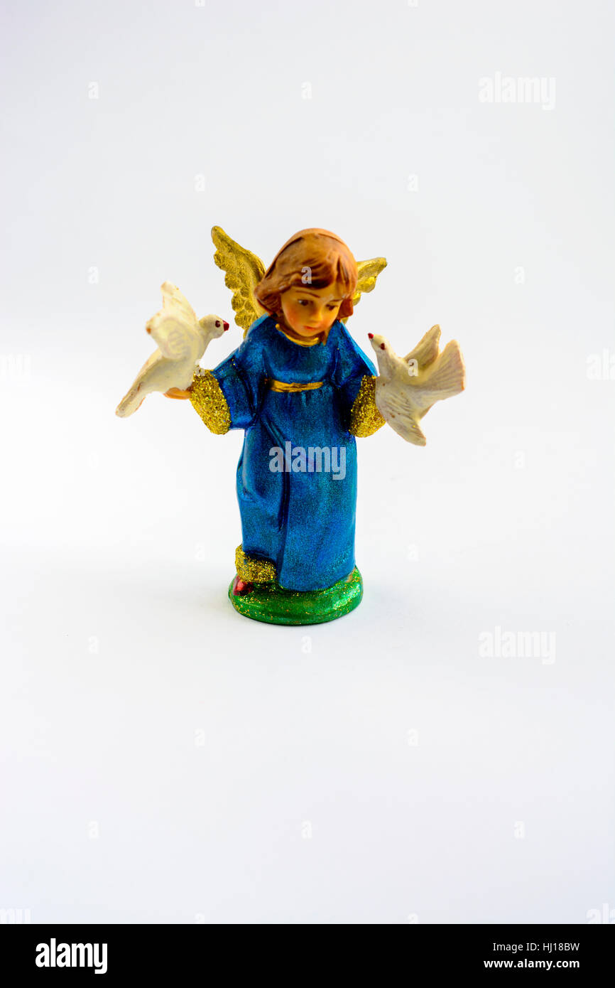 A small sculpture. Single figurines on a white background Stock Photo ...