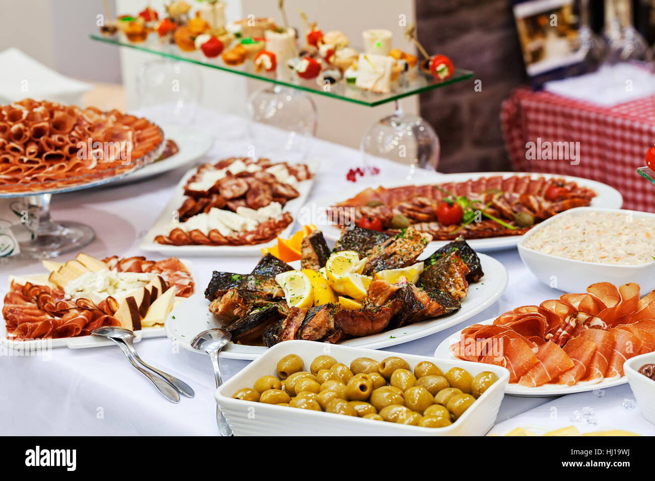 decorated Swedish table with a variety of good food, note shallow depth ...