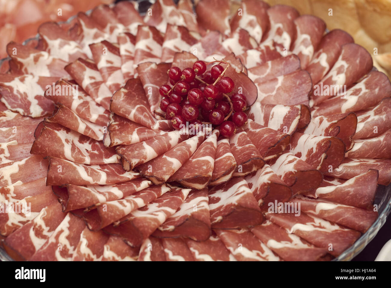 ham decorated with cranberries Stock Photo - Alamy