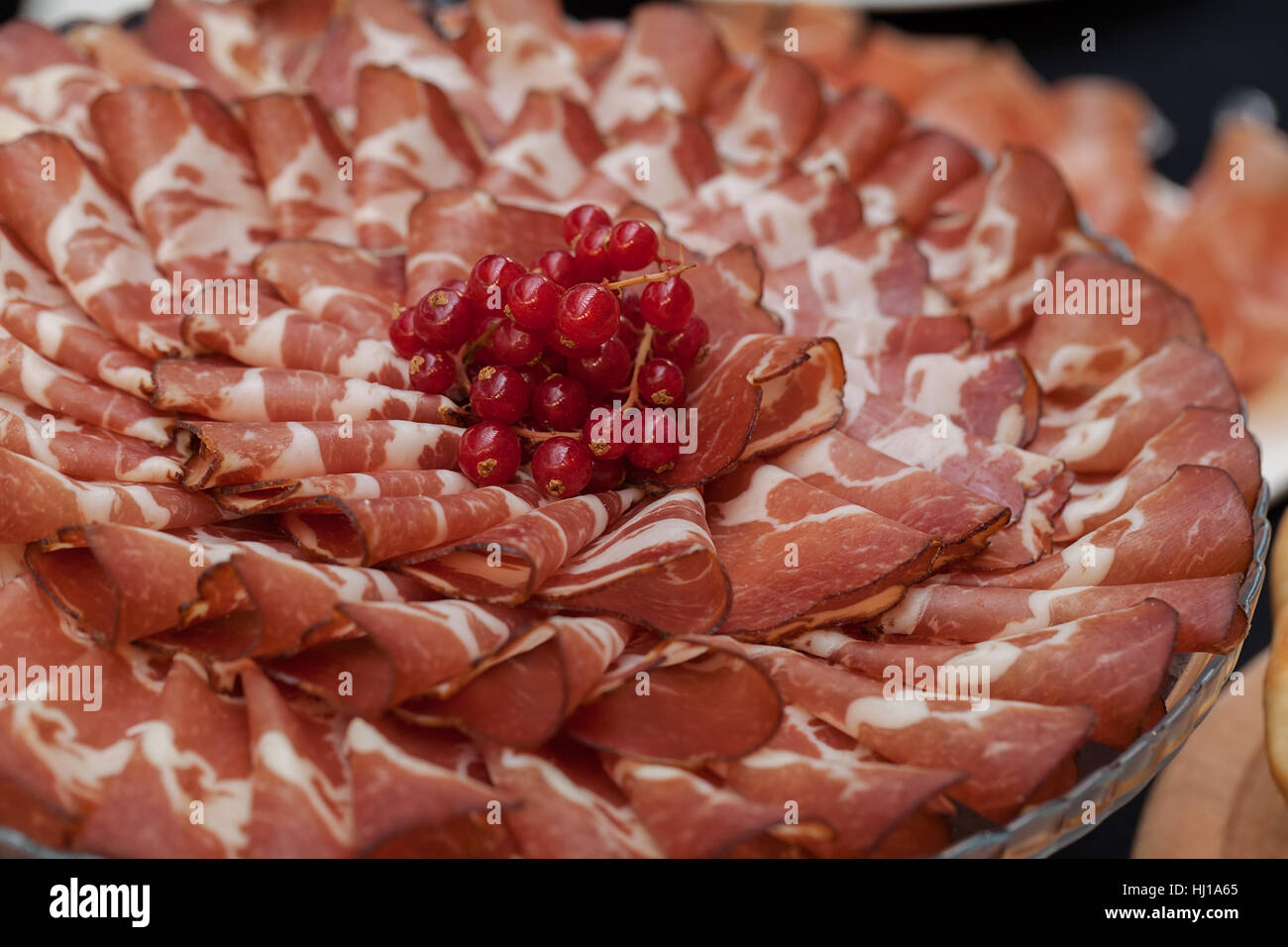 ham decorated with cranberries Stock Photo - Alamy