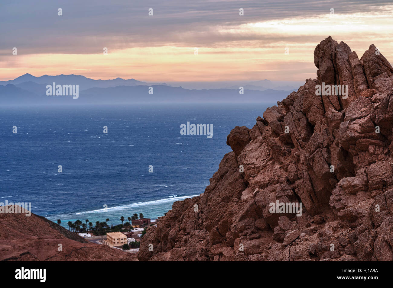 red rock on the red sea Stock Photo - Alamy