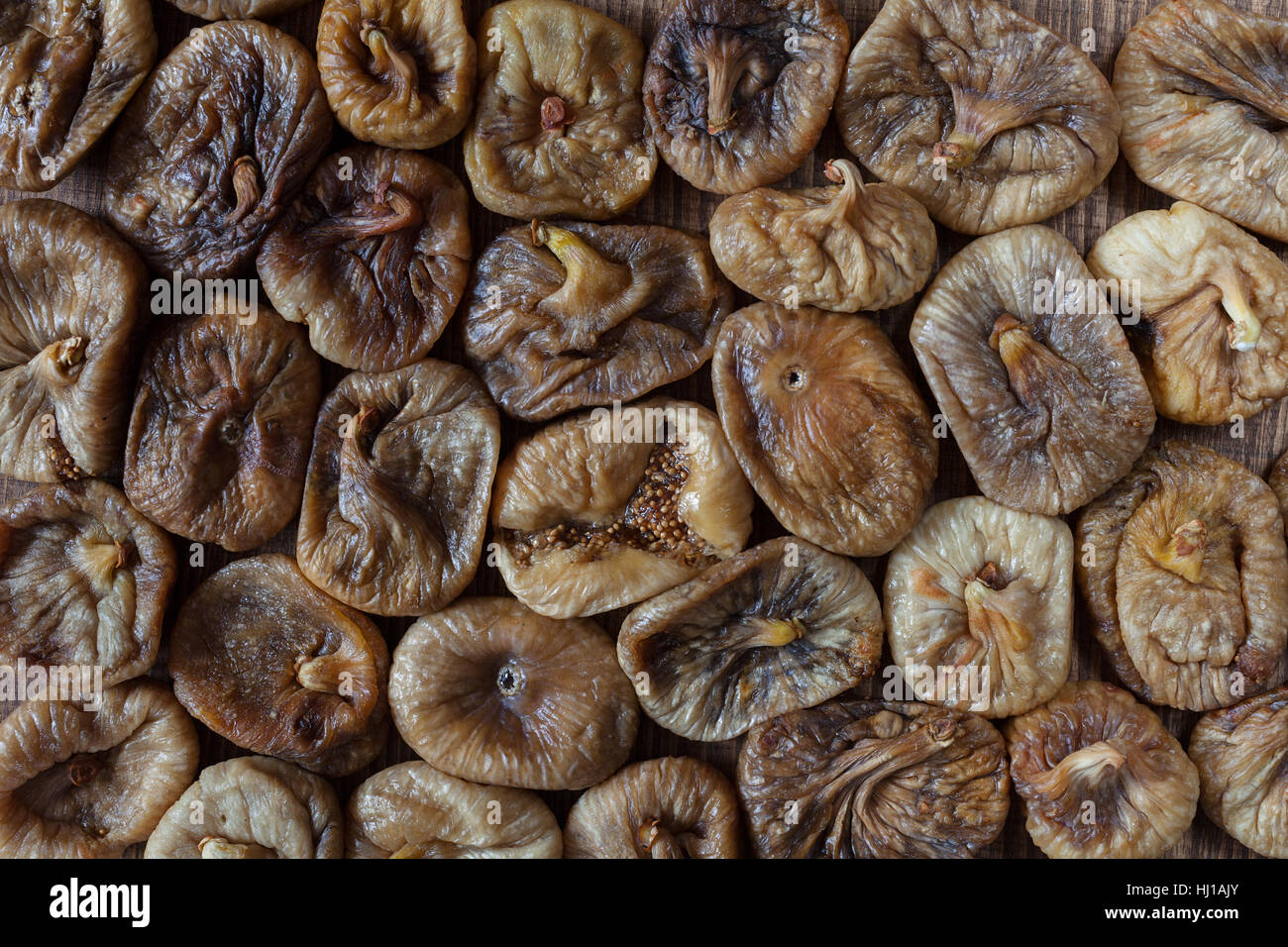 dried figs like a background, note shallow depth of field Stock Photo ...