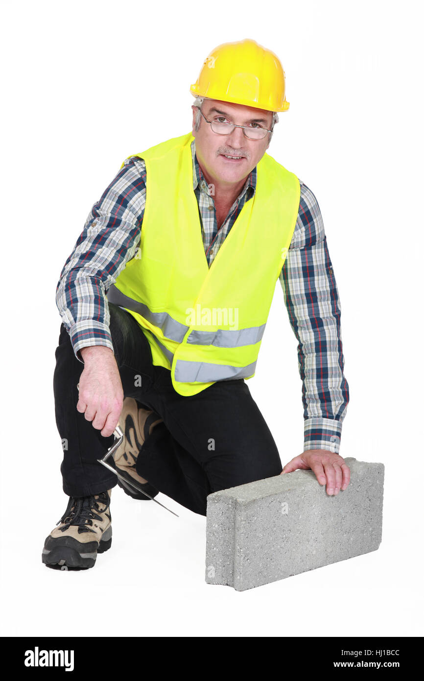 Concrete worker construction cut Cut Out Stock Images & Pictures - Alamy