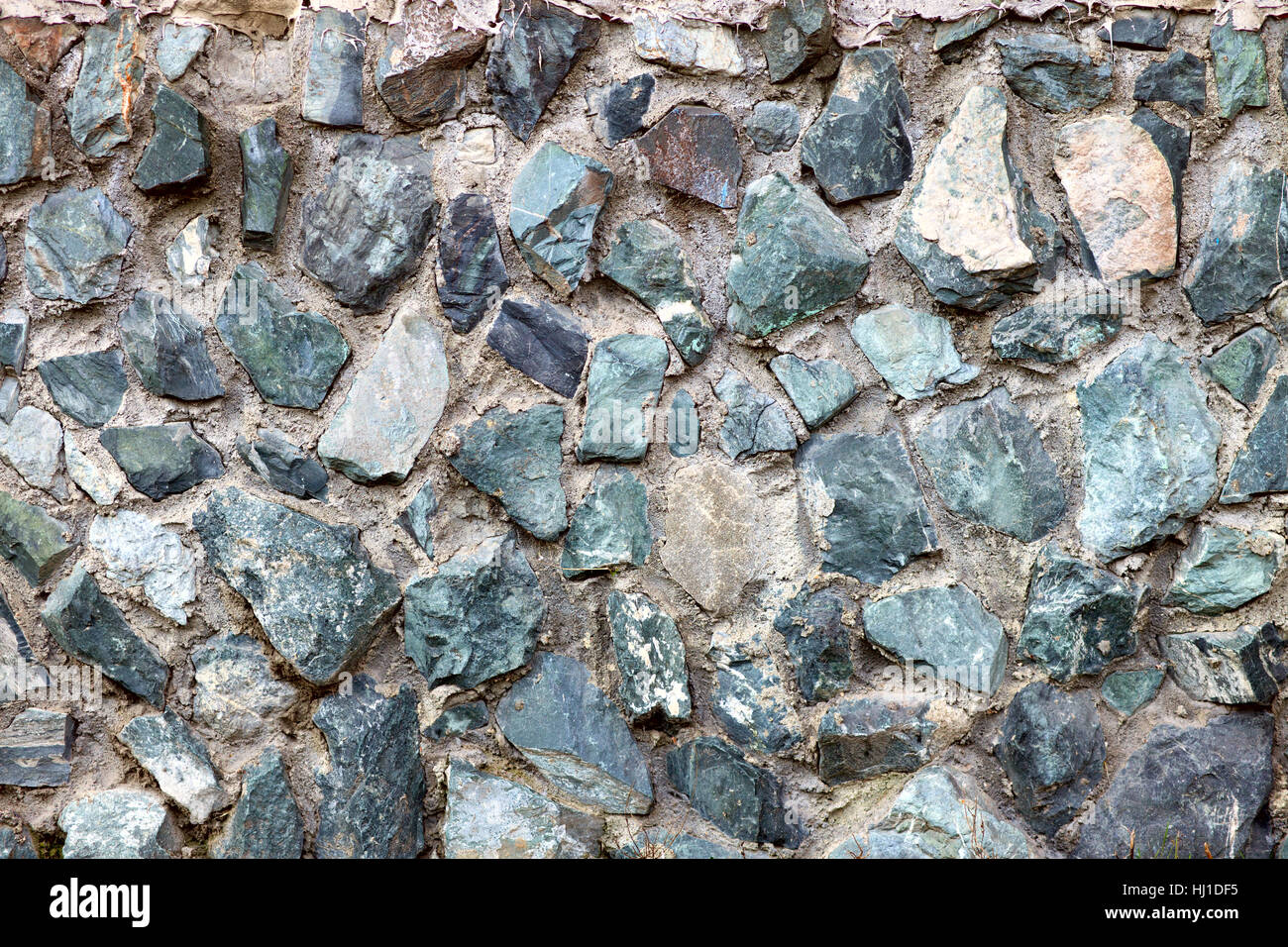 Old stone foundations and wall Stock Photo - Alamy